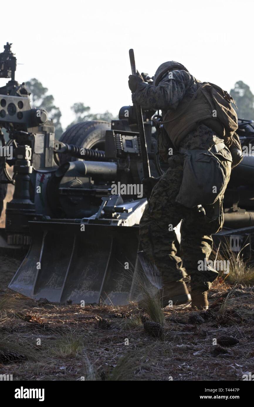 A U.S. Marine with Bravo Battery, 1st Battalion, 10th Marine Regiment ...