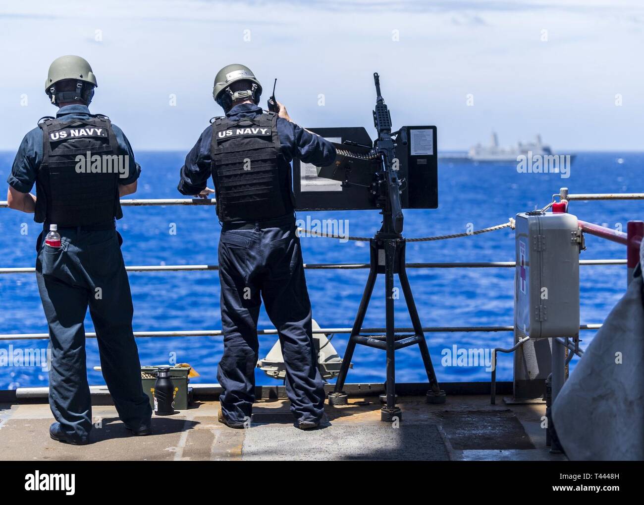 PACIFIC OCEAN (March 14, 2019) – Sailors man the M2HB .50-caliber ...