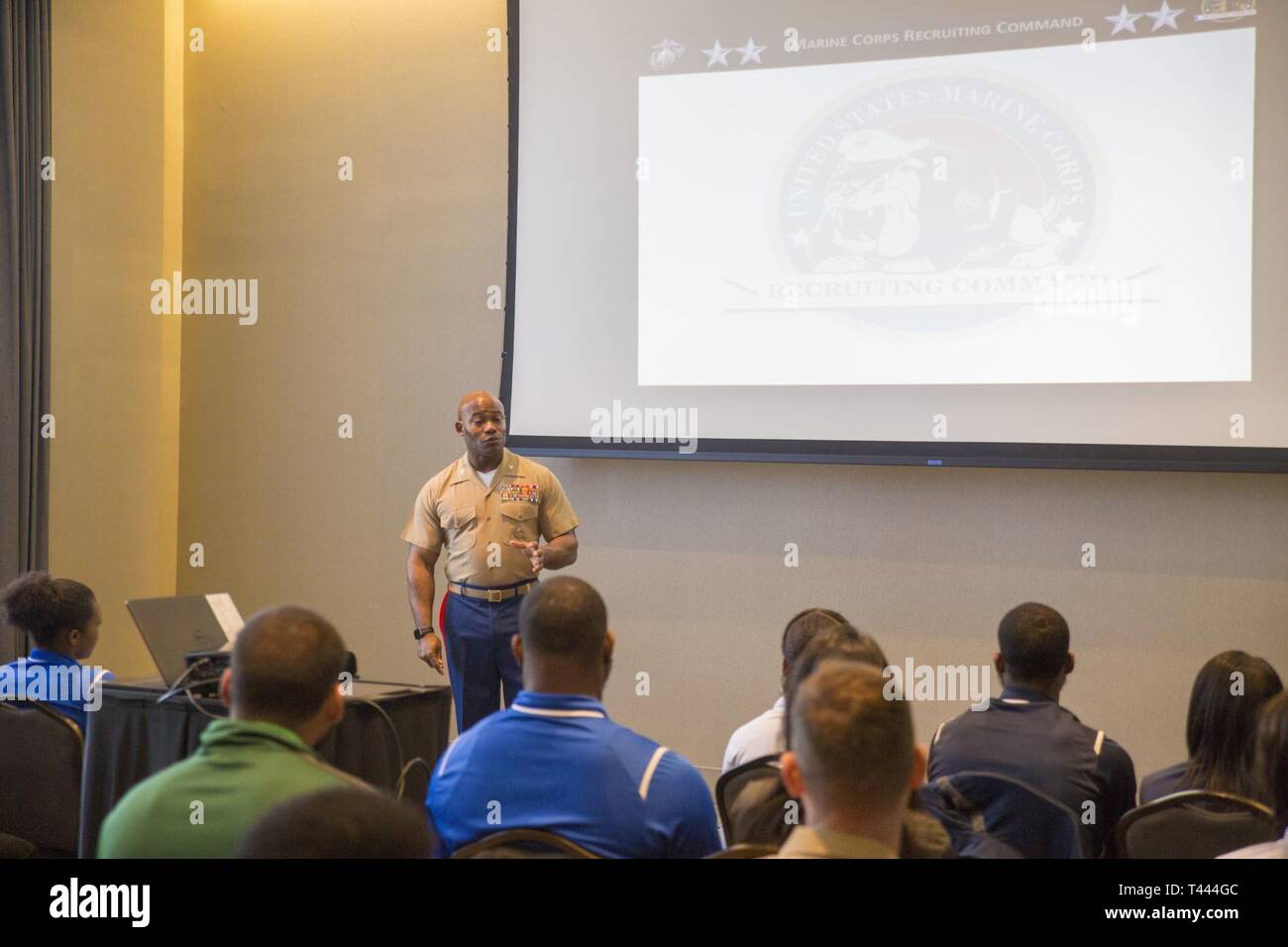 Marine Col. Anthony Henderson teaches athletes about Marine Corps ...