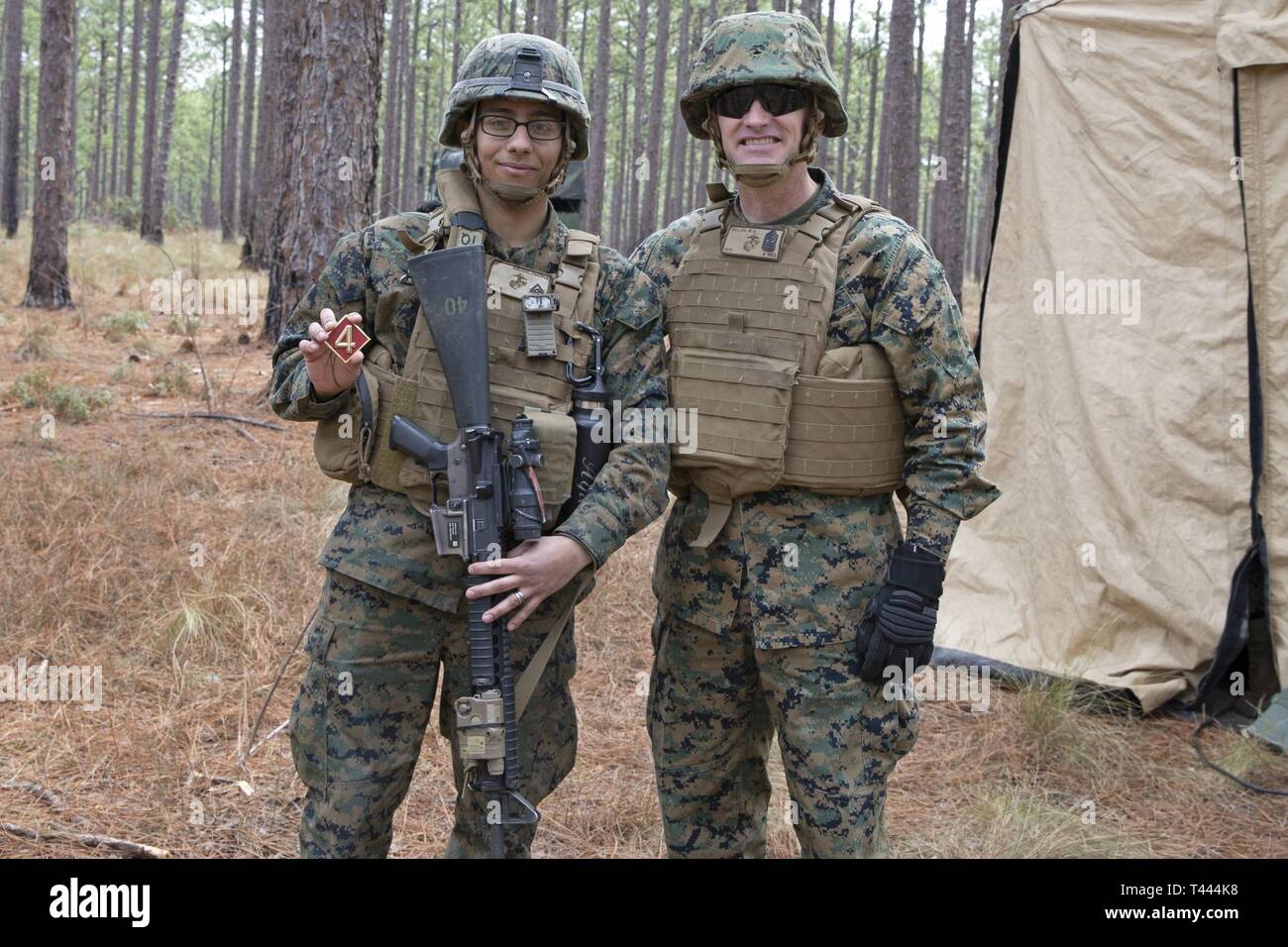 U.S. Marine Sgt. Maj. Mike Miller, right, division sergeant major, 4th ...