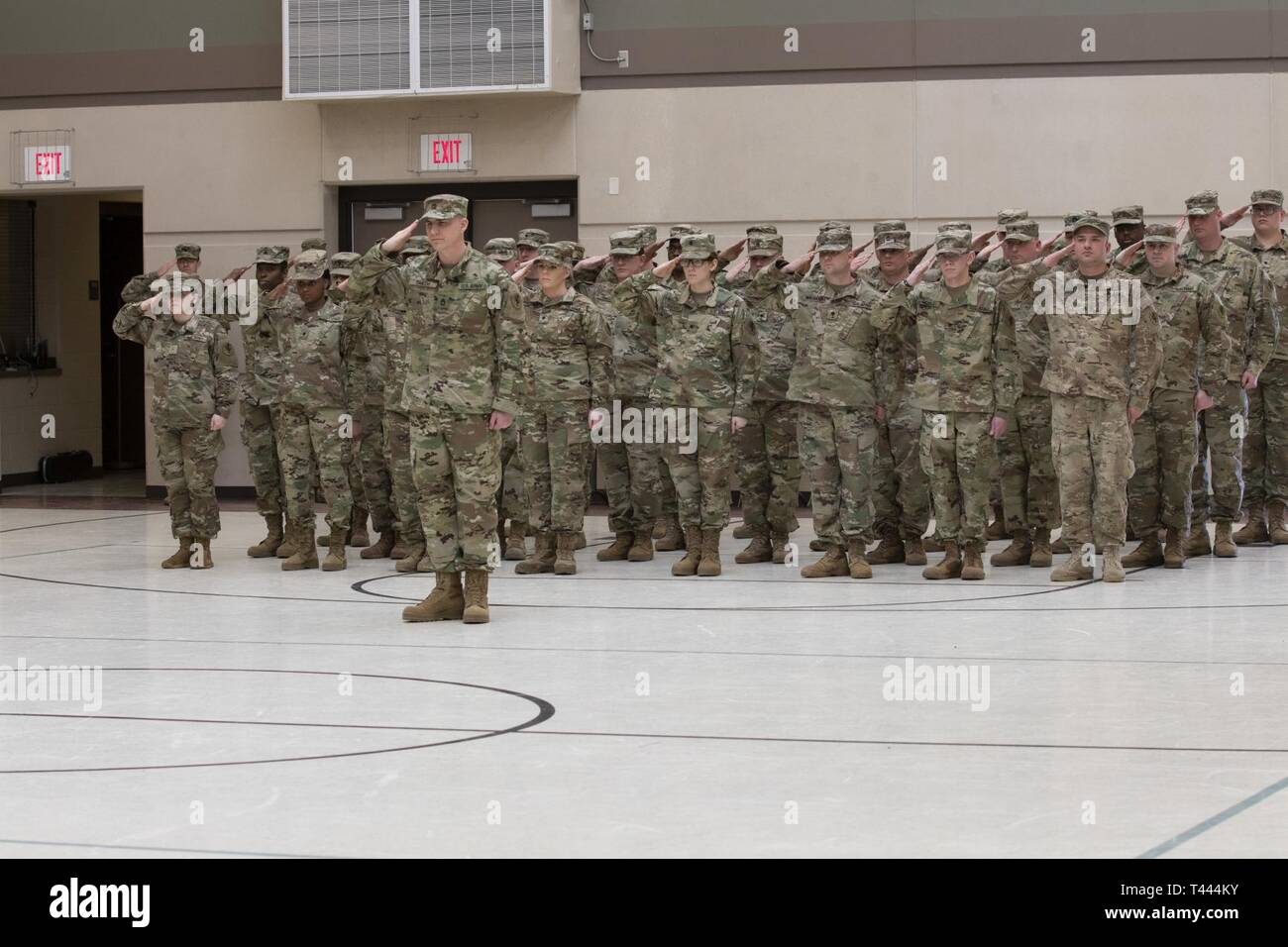 Soldiers from the 419th Movement Control Battalion render a salute in ...