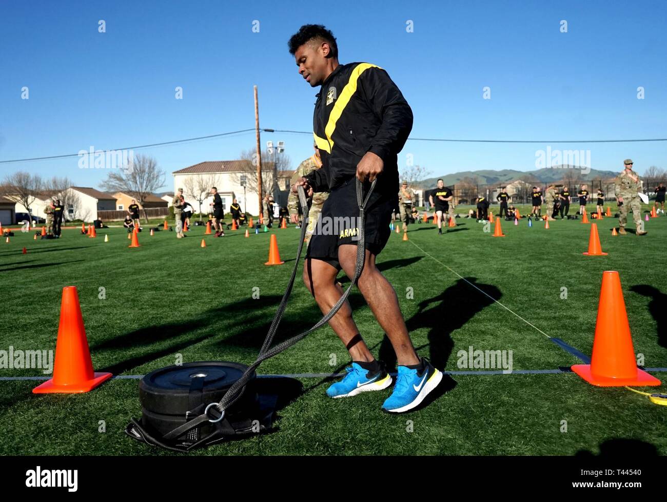 A Soldier from the 223rd Military Intelligence Battalion performs drags ...
