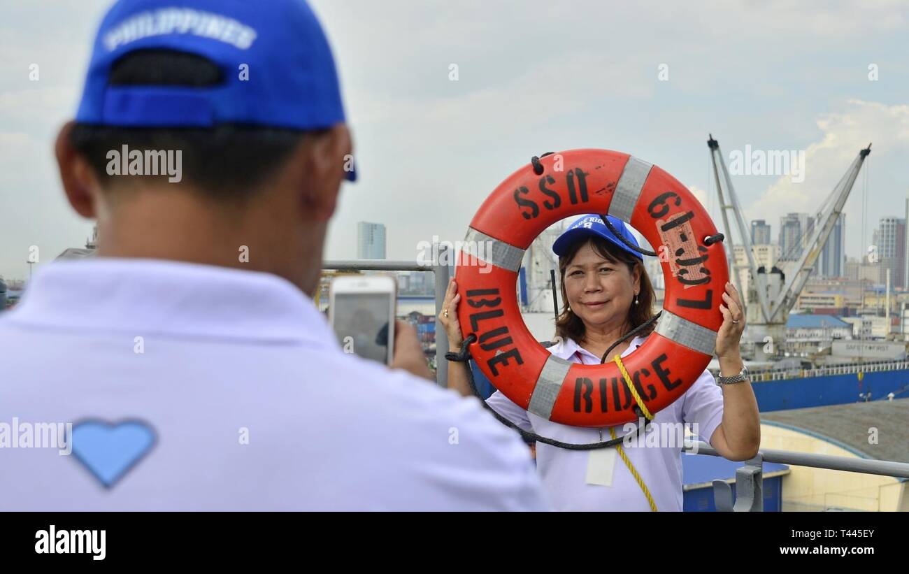 MANILA, Philippines (March 17, 2019) - A member of the Quezon City ...