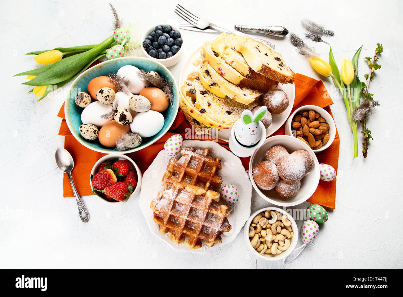 Festive Easter table setting.Top view Stock Photo - Alamy