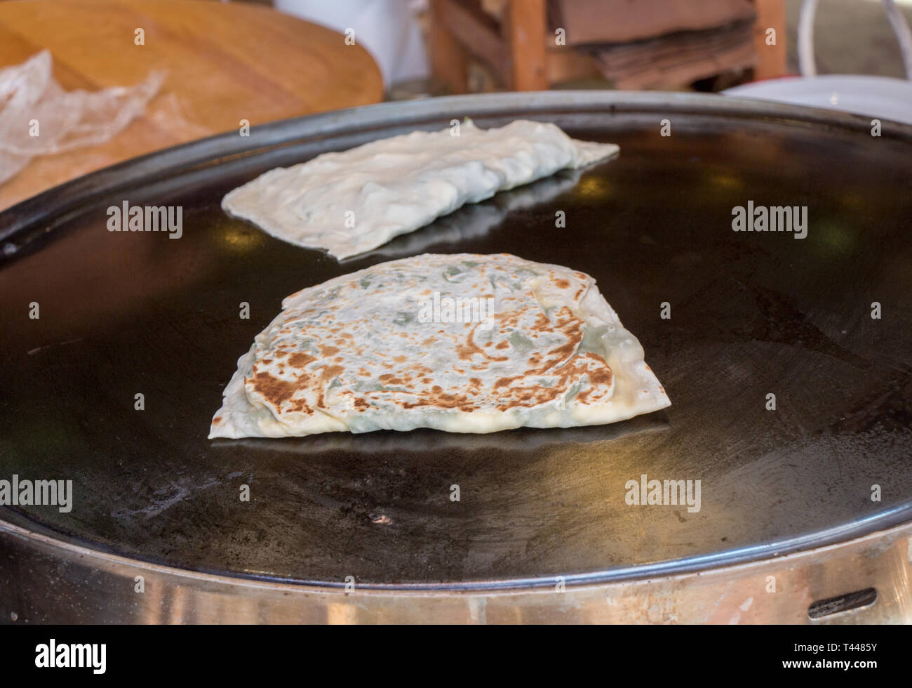 Home making of traditional turkish gozleme pancake Stock Photo - Alamy
