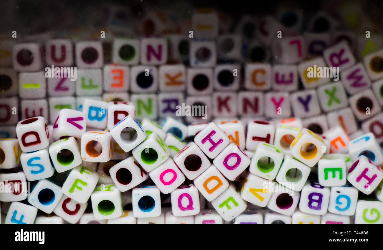 Colorful alphabet letter cubes in view Stock Photo - Alamy