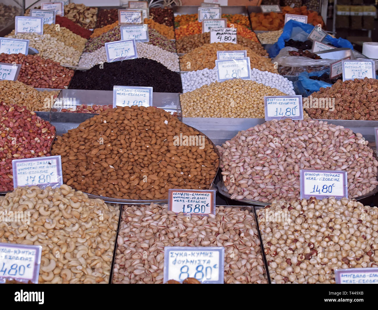 Mix of colorful nuts and spices at a food market Stock Photo - Alamy