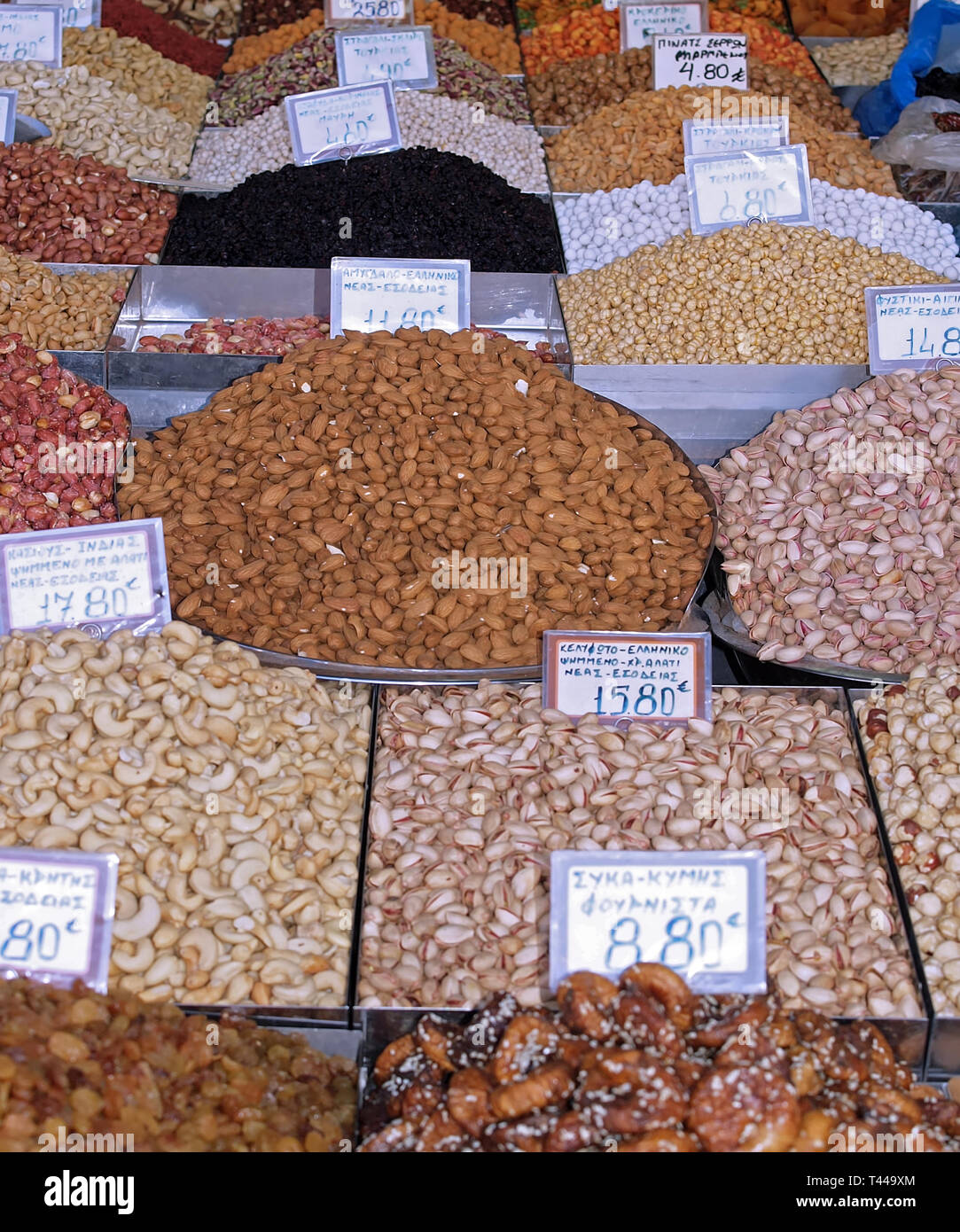 Mix of colorful nuts and spices at a food market Stock Photo - Alamy