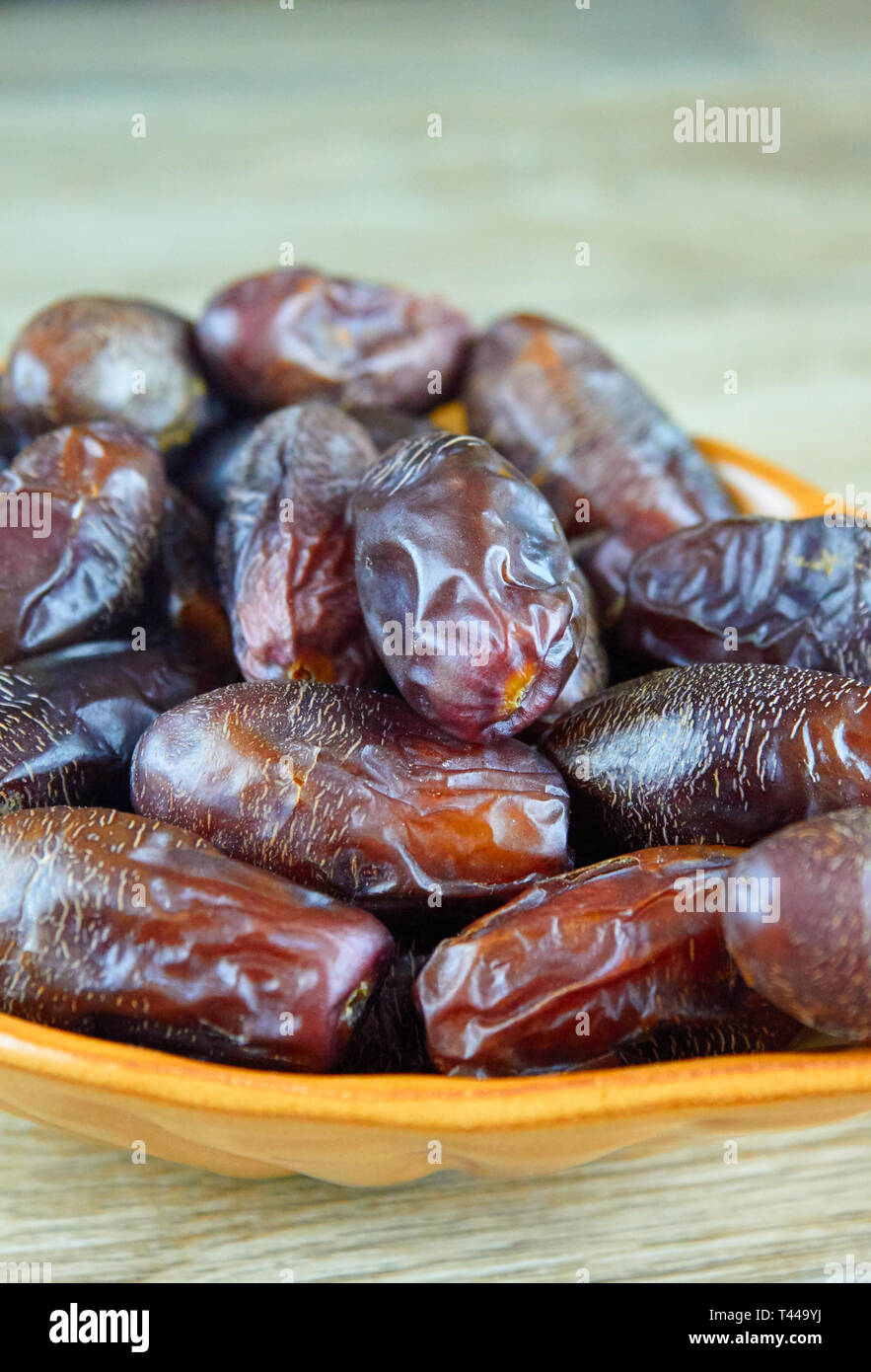 sweet algerian arabic dates fruits on a plate Stock Photo - Alamy