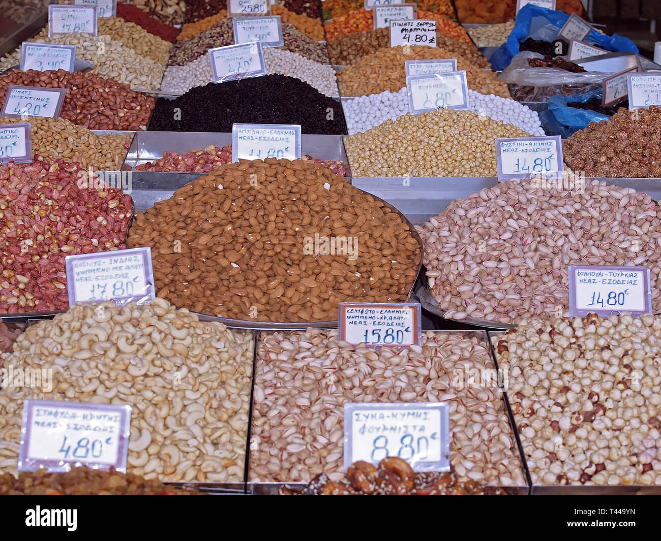 Mix of colorful nuts and spices at a food market Stock Photo - Alamy