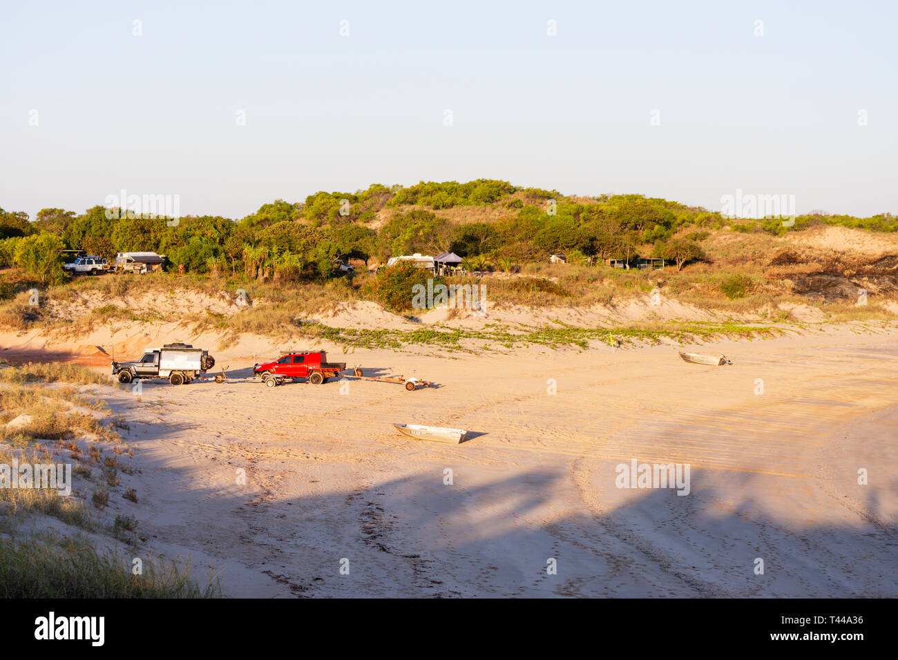 4WDs and boats on beach at Middle Lagoon, Dampier Peninsula, Western ...