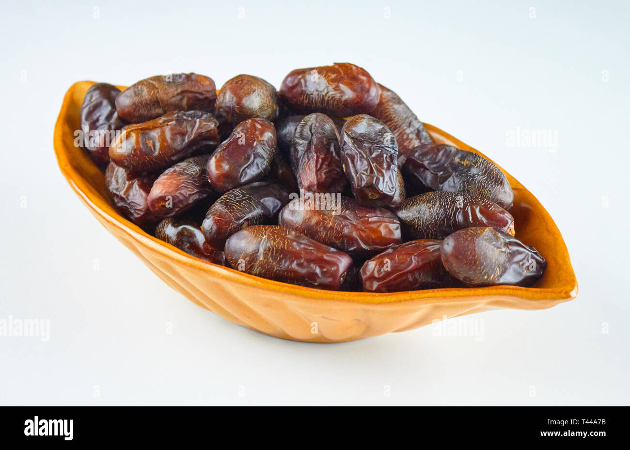 sweet algerian arabic dates fruits on a plate Stock Photo - Alamy