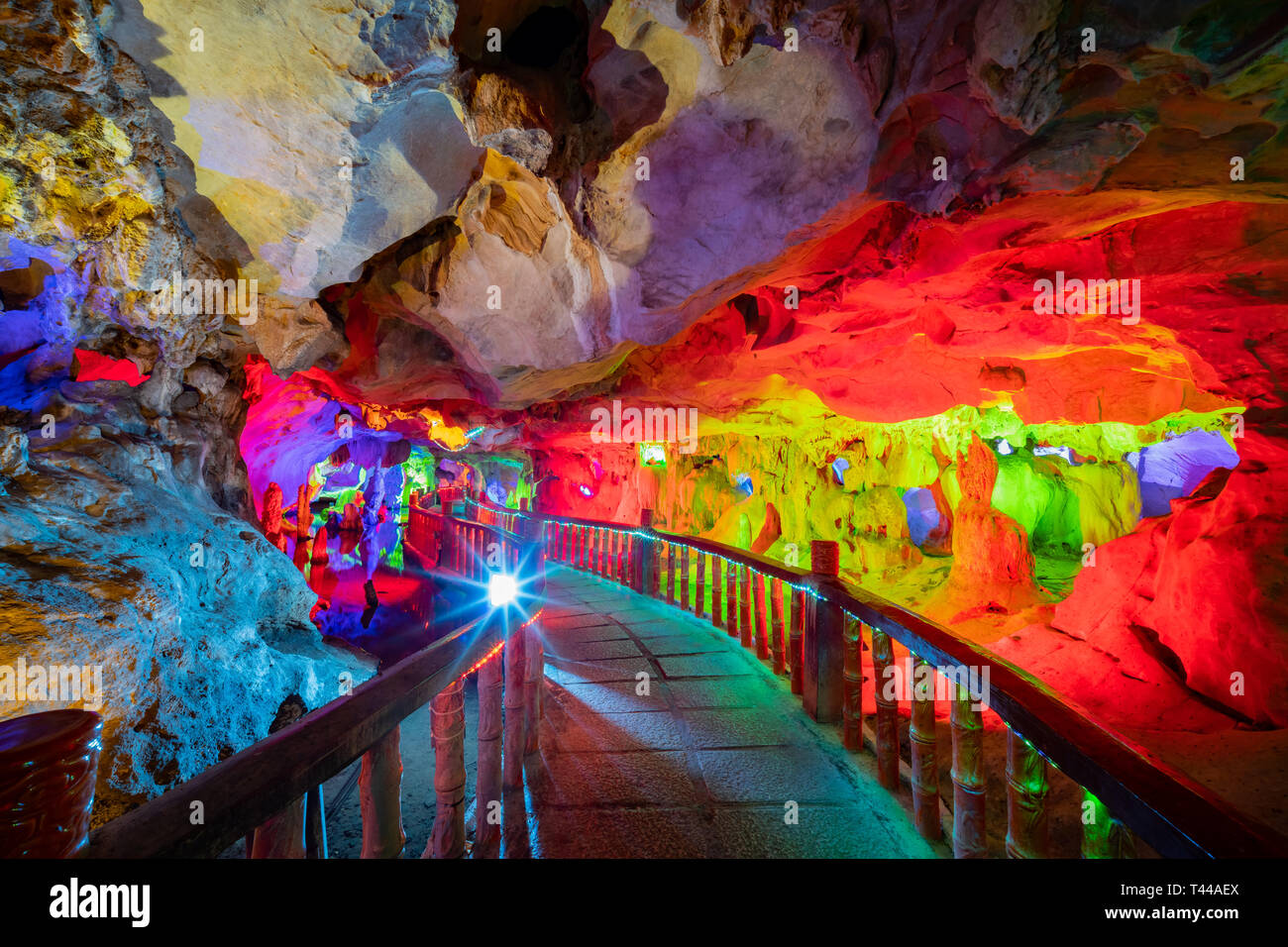 The beautiful Seven Star cave with colorful lights and reflection at ...