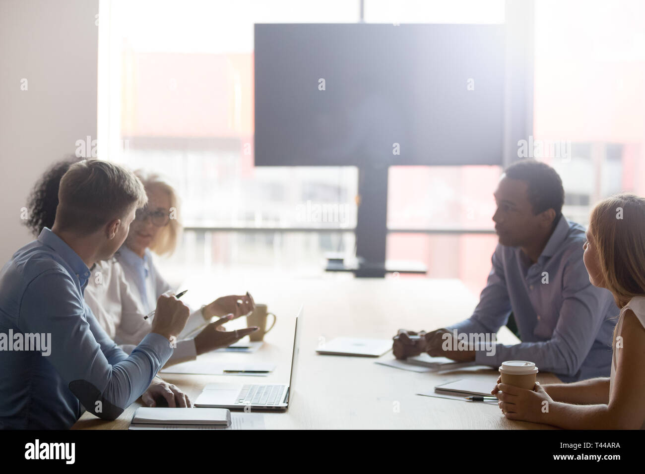 Group sit hi-res stock photography and images - Alamy