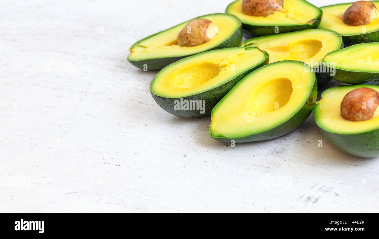 Side view half organic avocado hi-res stock photography and images - Alamy