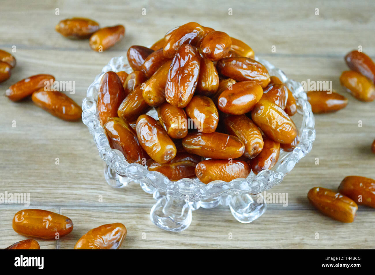sweet algerian arabic dates fruits on a glass plate Stock Photo - Alamy