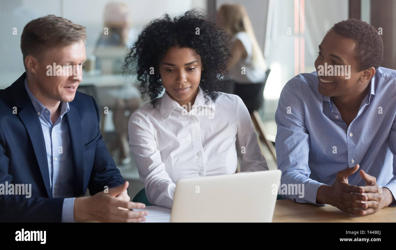 Broker insurer consulting african american clients couple looking at ...