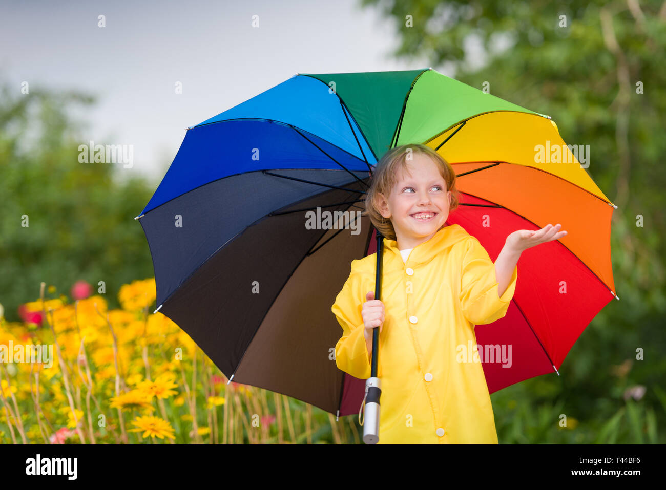 kid with umbrella Stock Photo - Alamy