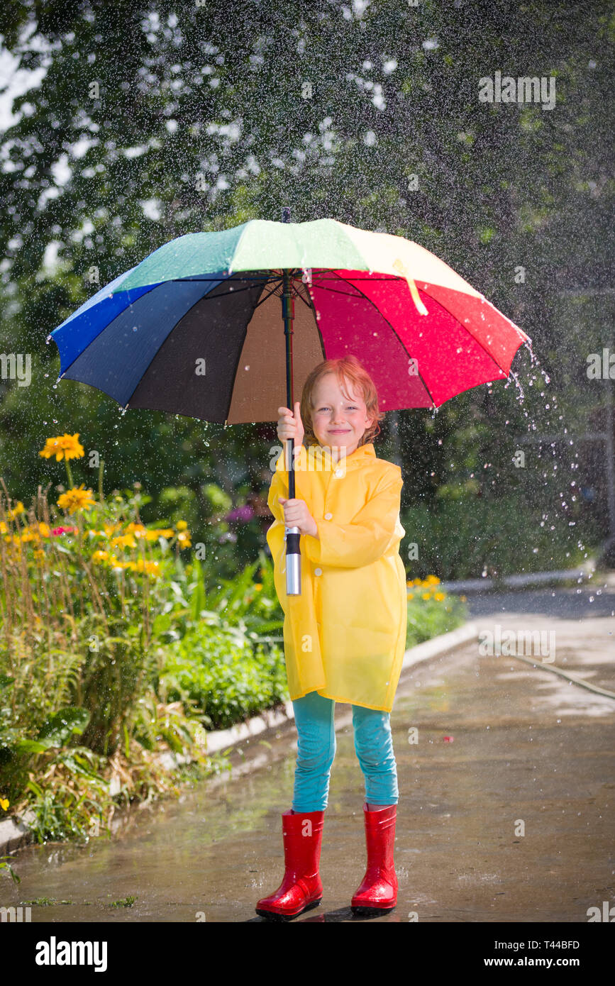 kid with umbrella Stock Photo - Alamy