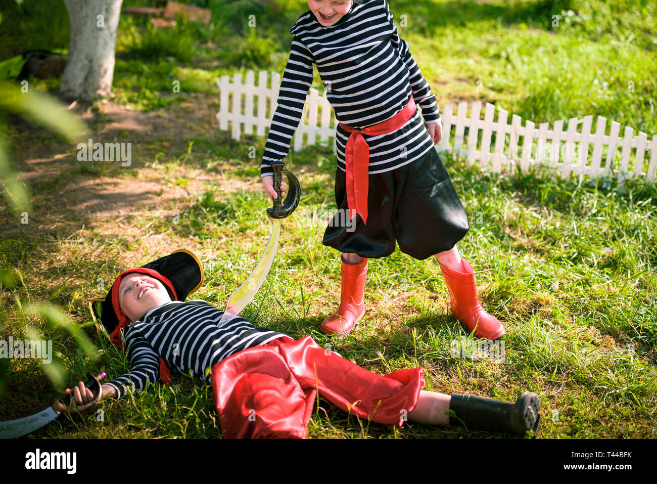 children play pirates at backyard Stock Photo - Alamy