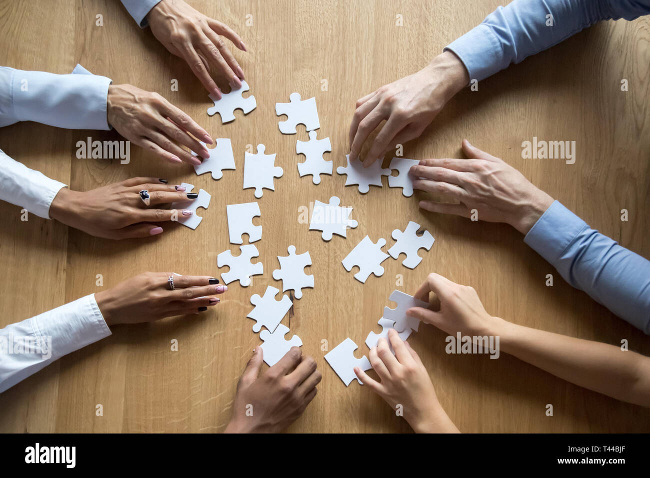 Team work together find solution hi-res stock photography and images ...