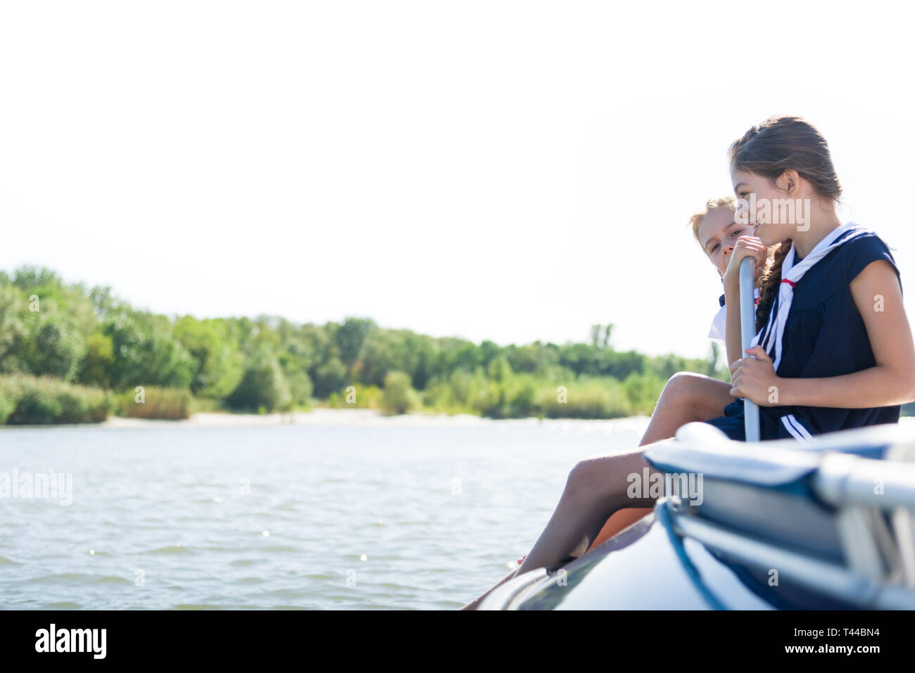 children sailing on boat Stock Photo - Alamy