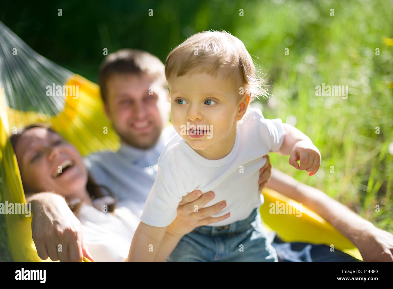 happy family having fun outdoors Stock Photo - Alamy