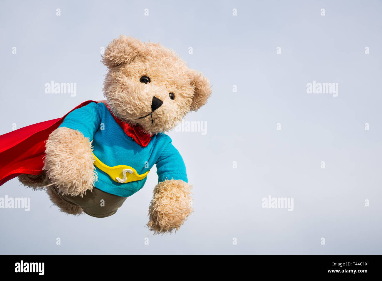 a super hero toy fly Stock Photo - Alamy