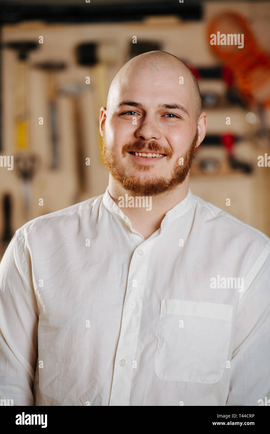 Portrait of a carpenter in his workshop Stock Photo - Alamy