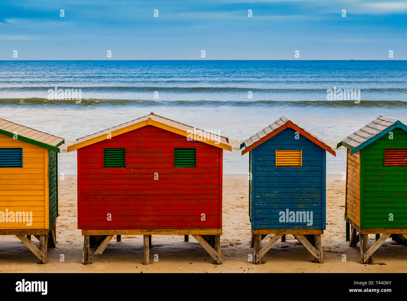 Colorful bathing huts in Muizenberg beach, in front of the ocean sea ...
