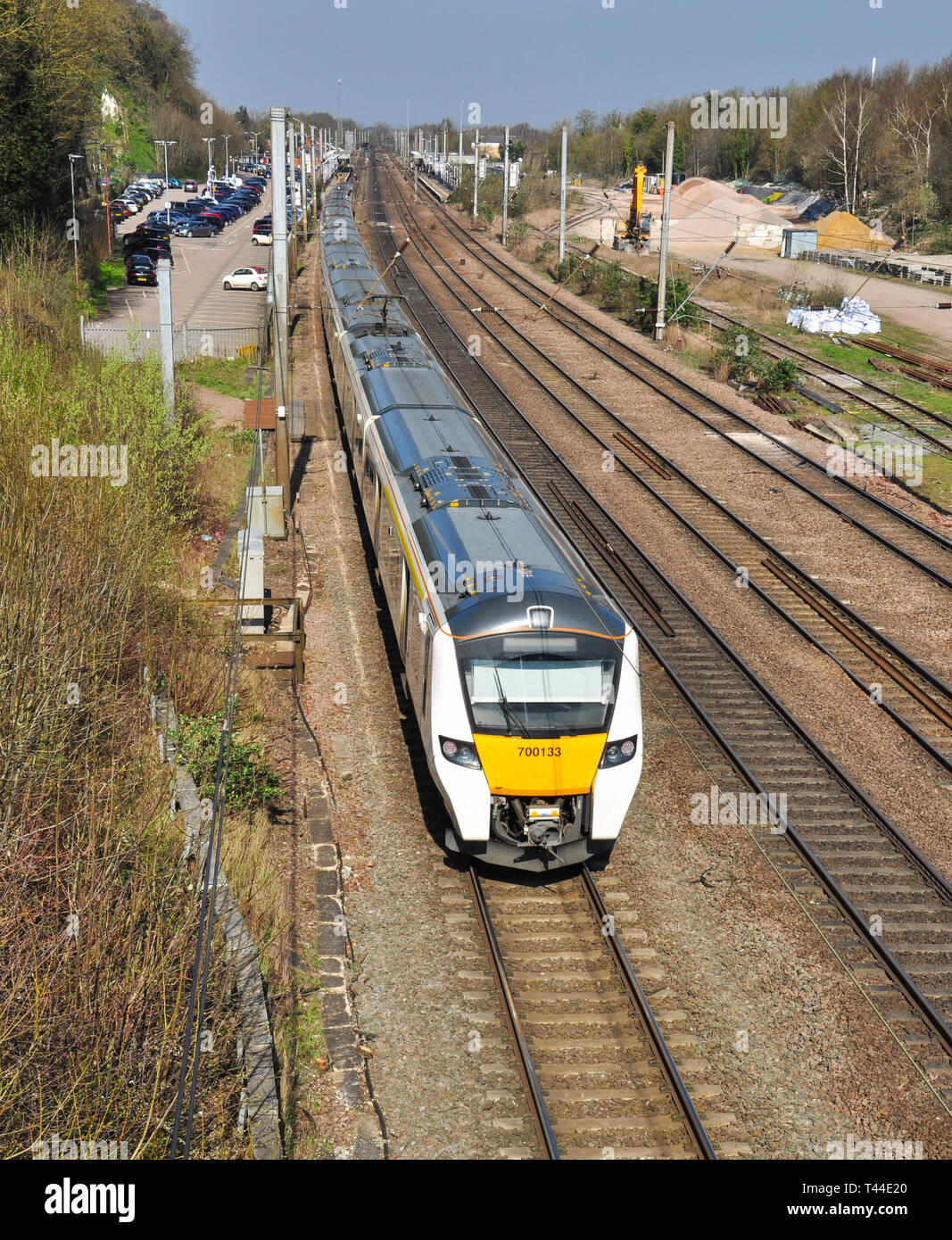 A northbound Class 700 EMU heads into Hitchin station, Hertfordshire ...