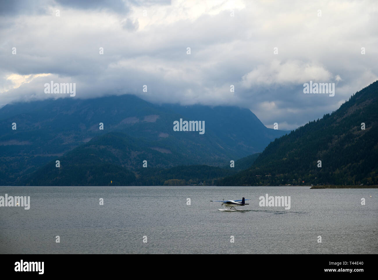 Hydroplane taking off from the water aerodrome on Harrison Lake over ...
