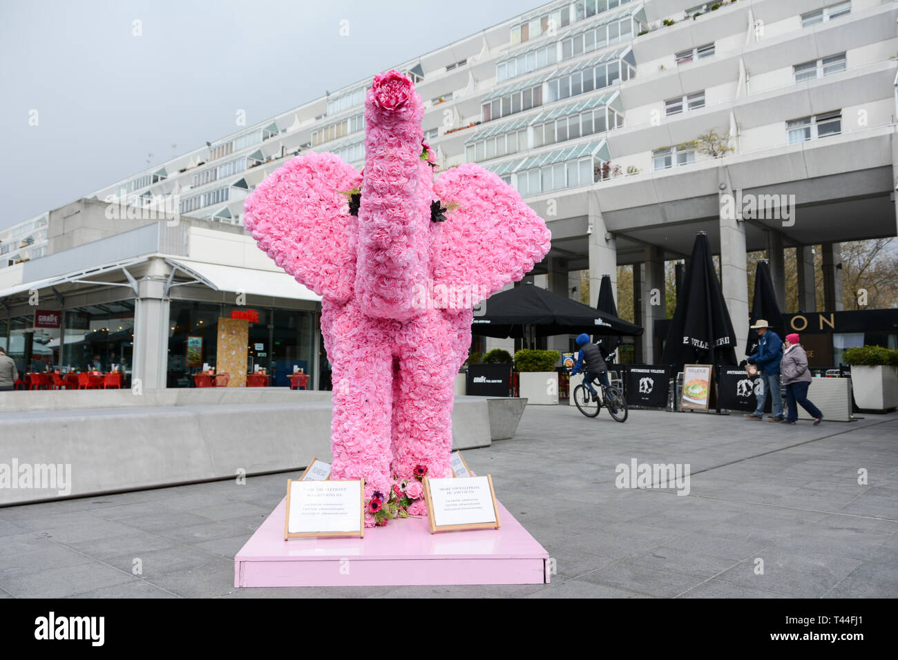 Pink elephant with pink people hi-res stock photography and images - Alamy