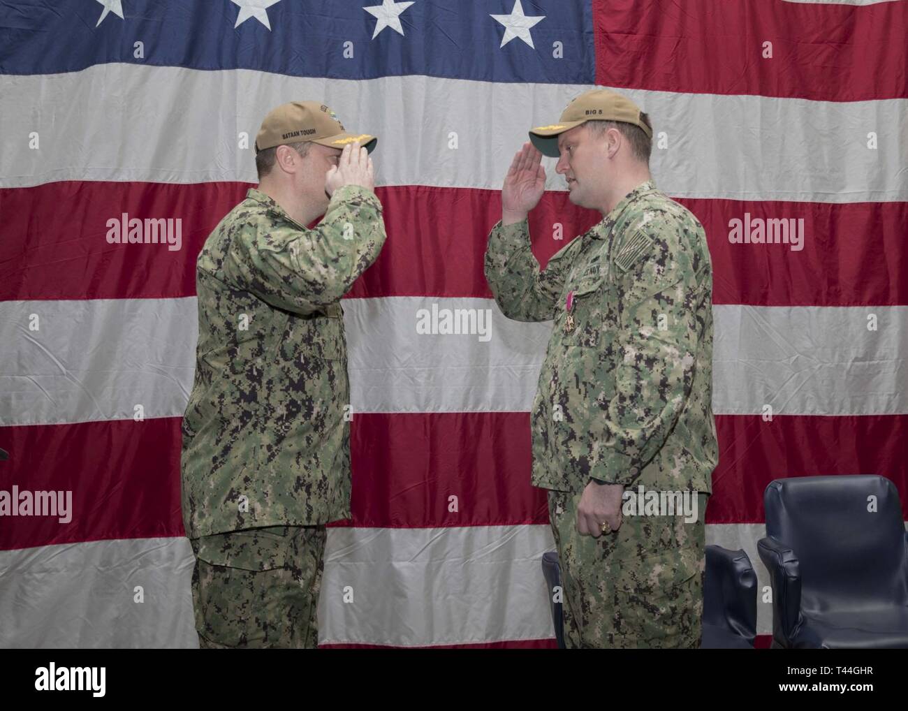 OCEAN (Feb. 28, 2018) Captain Gregory Leland (left) salutes Captain ...