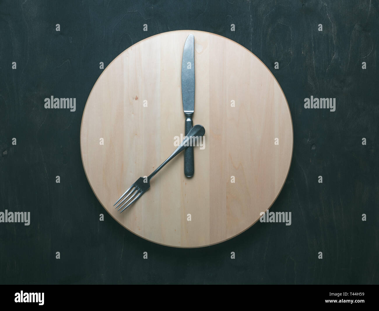 Intermittent fasting and skip breakfast concept - empty wooden round ...