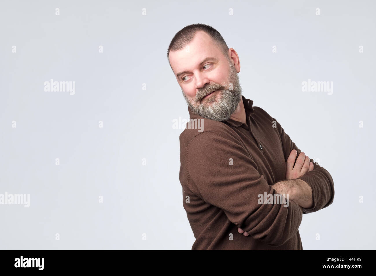 Looking back over his shoulder hi-res stock photography and images - Alamy
