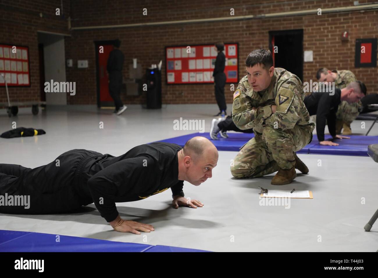 Sgt. Gary Payne, assigned to the 113th Sustainment Brigade, reaches his ...