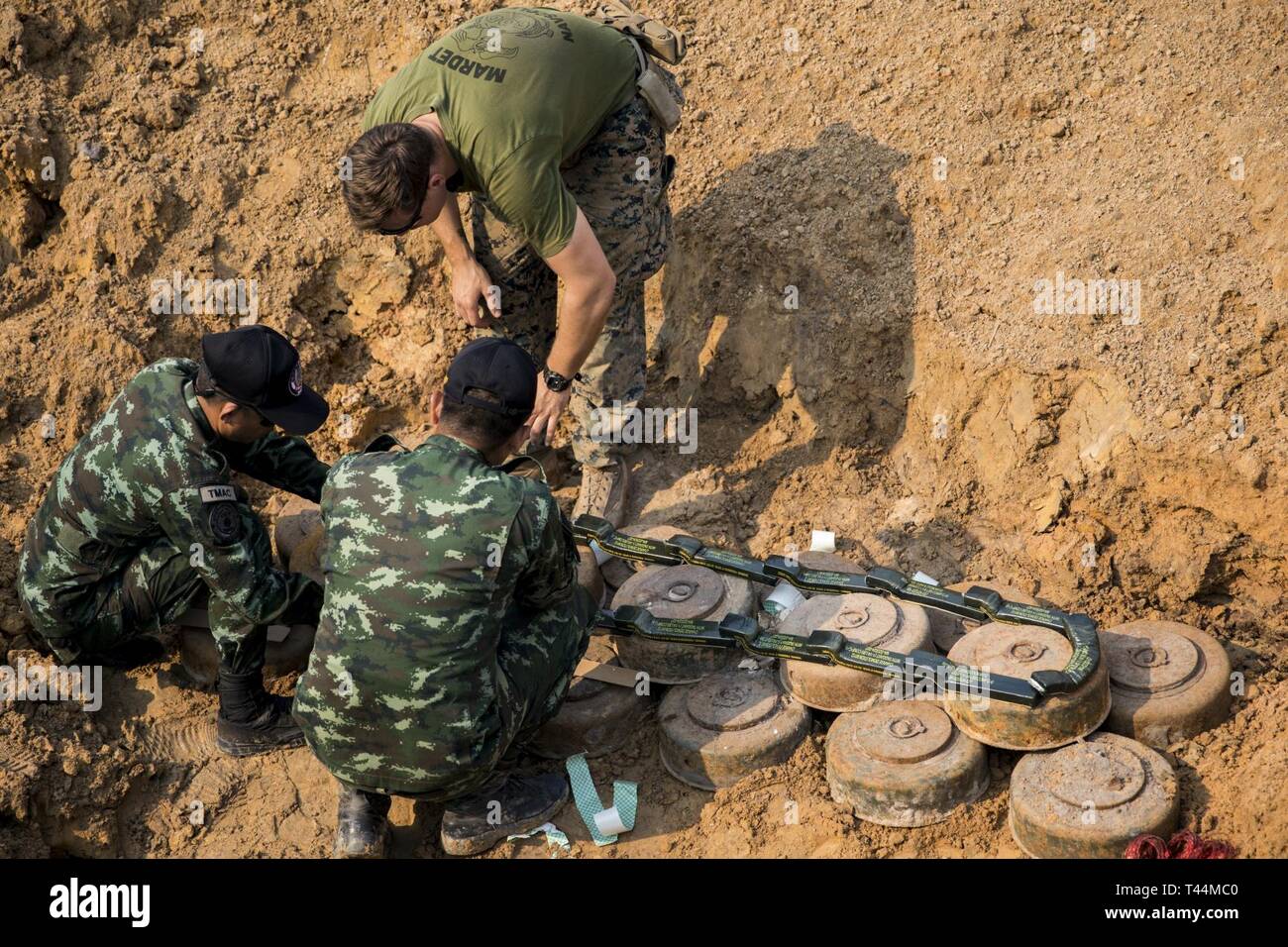 U.S. Marine Corps Sgt. Christopher Piette and Royal Thai explosive ...