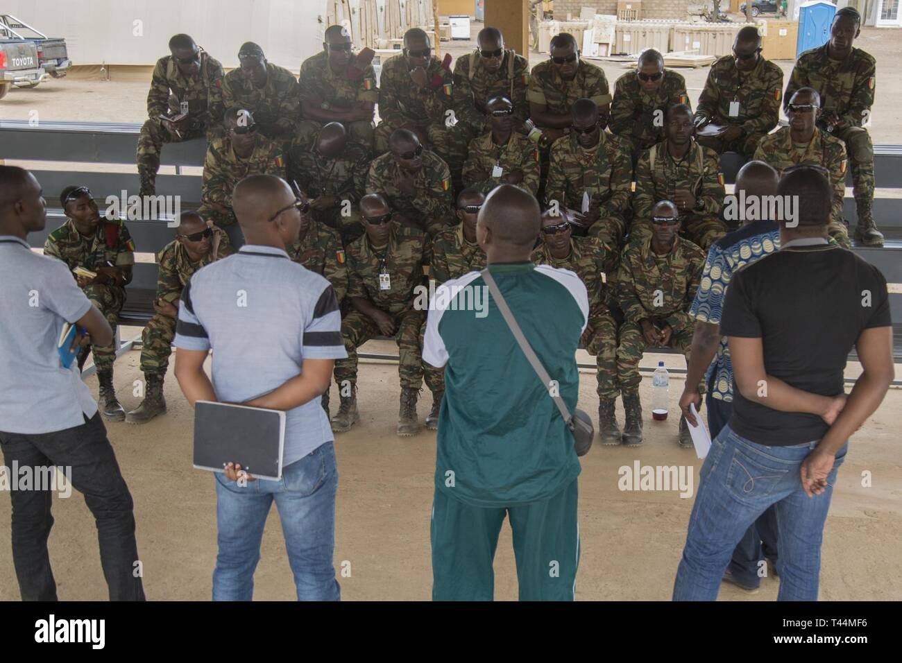 Guinean soldiers receive a Sensitive Exploitation class during Exercise ...