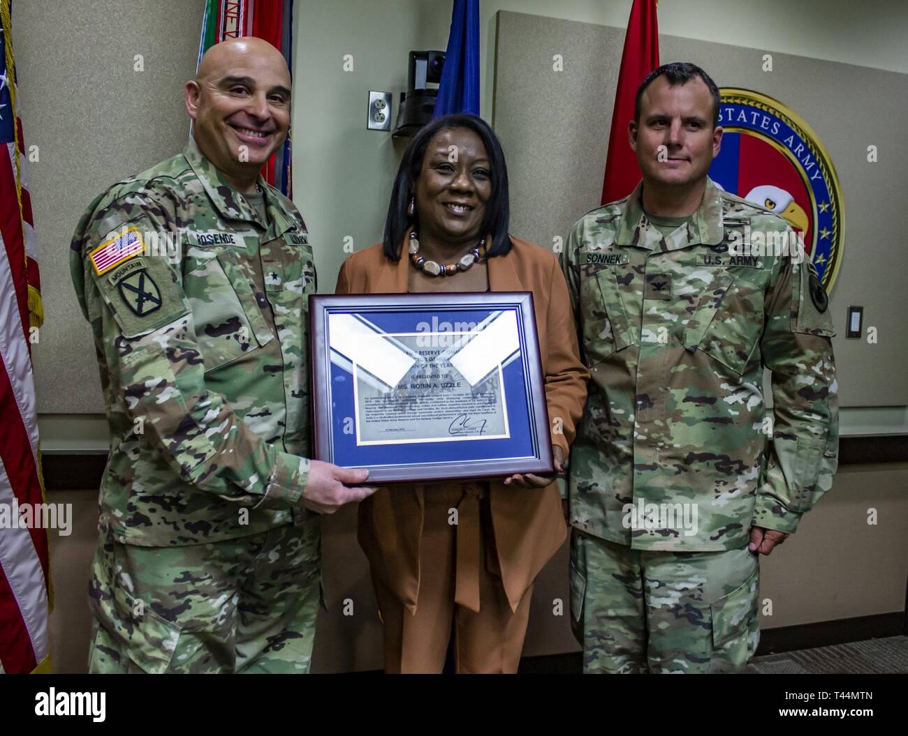 Ms. Robin Uzzle receives the U.S. Army Reserve Command's Inspector ...