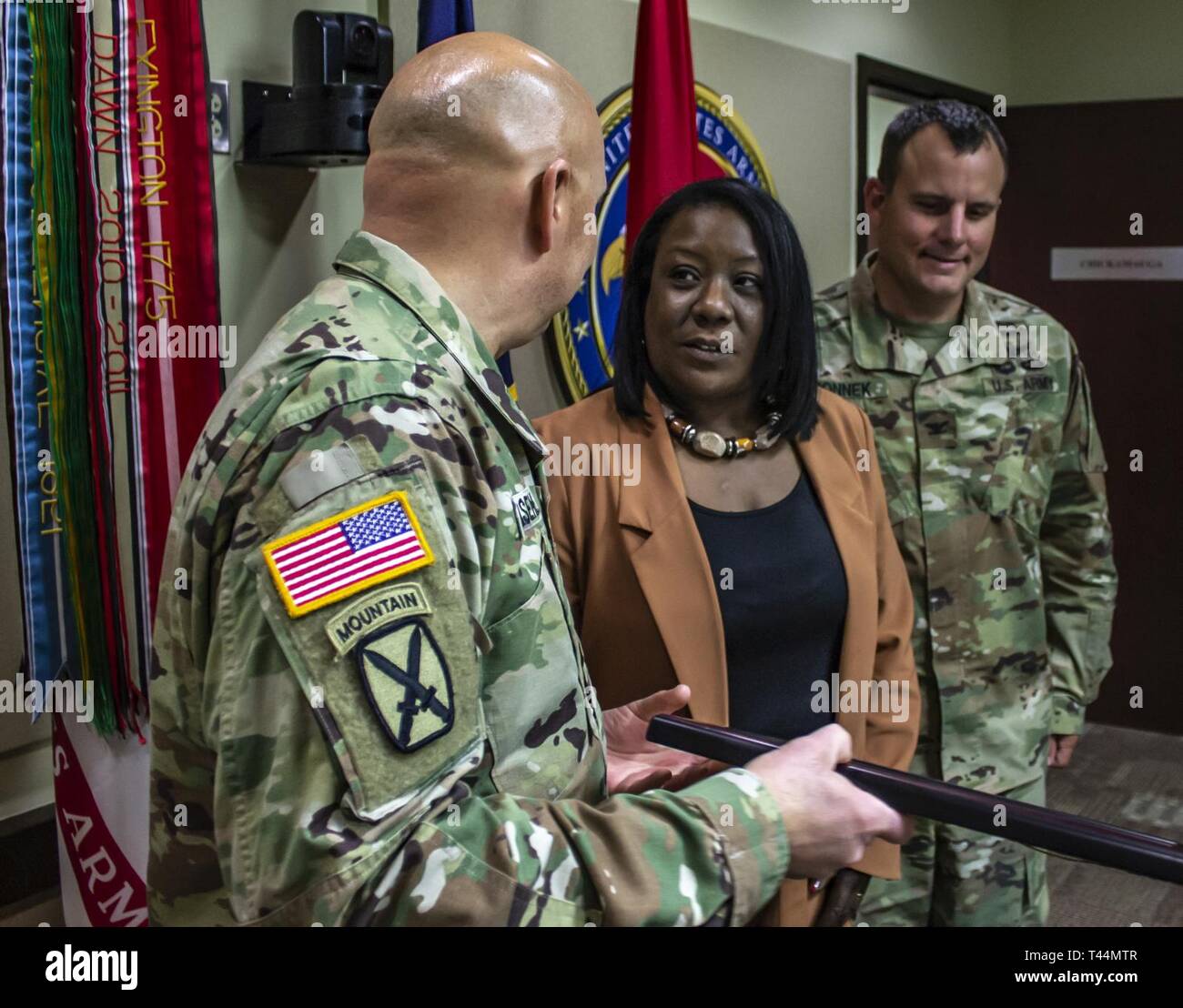 Ms. Robin Uzzle receives the U.S. Army Reserve Command's Inspector ...