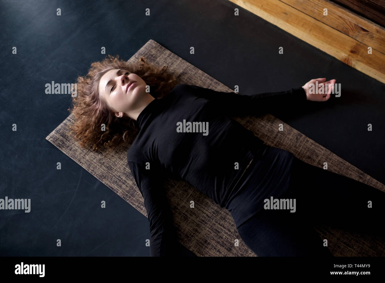 Young woman lying down dead hi-res stock photography and images - Alamy