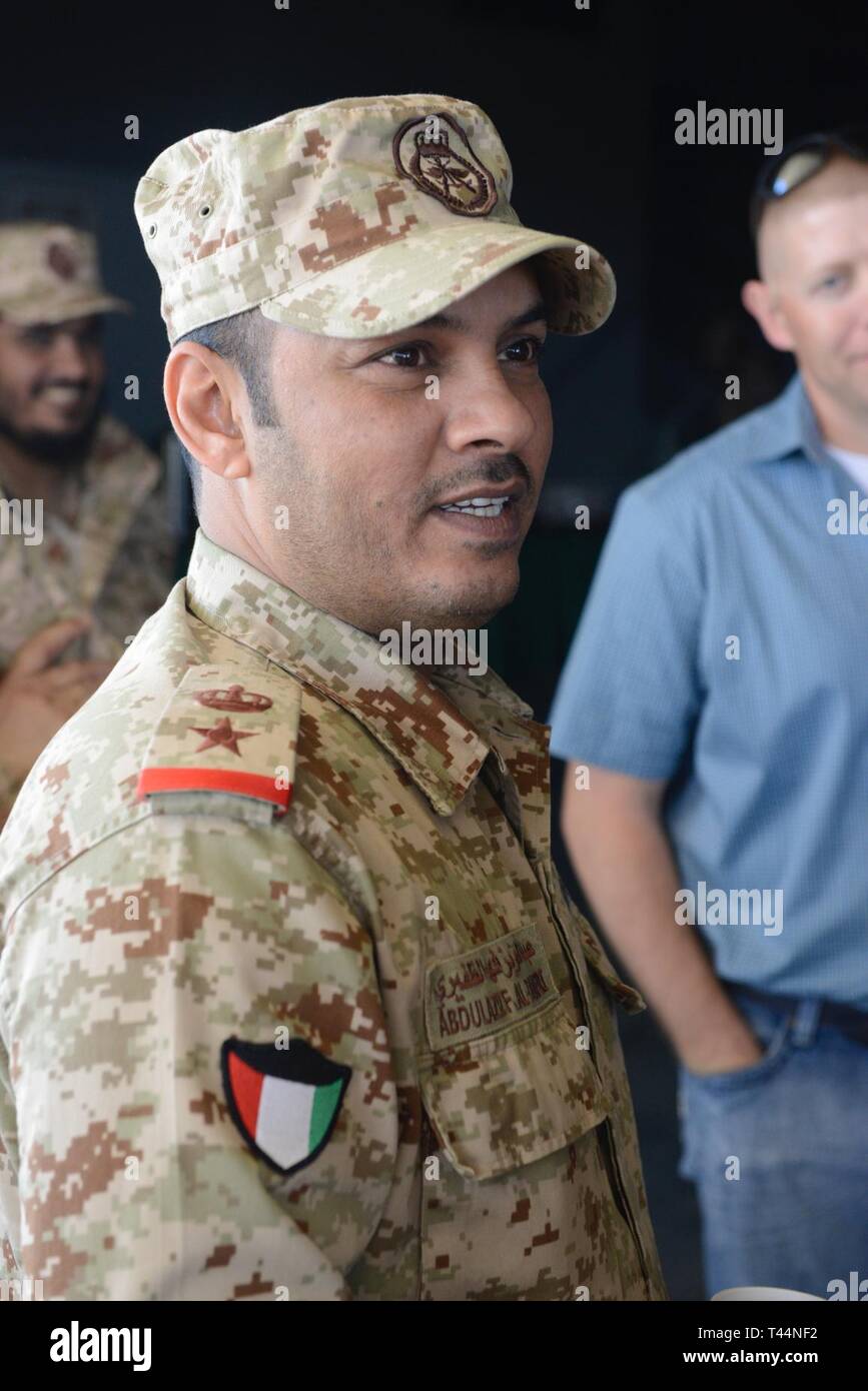 A lieutenant colonel from the Kuwait Land Force speaks with Soldiers ...