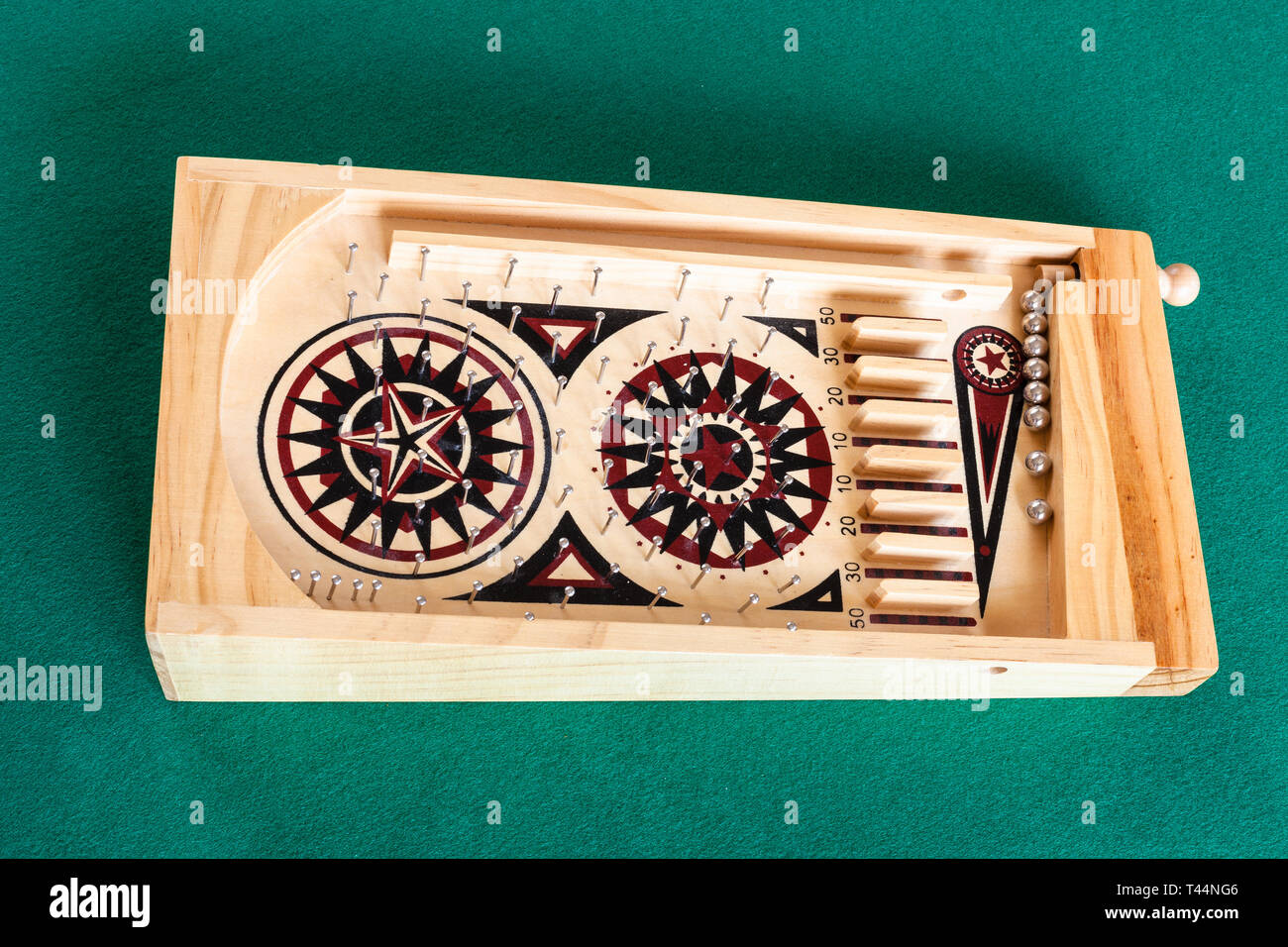 MOSCOW, RUSSIA - APRIL 2, 2019: small wooden vintage pinball game on ...