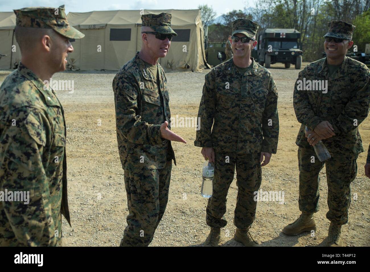 Lt. Gen. Eric M. Smith, center, commanding general of III Marine ...