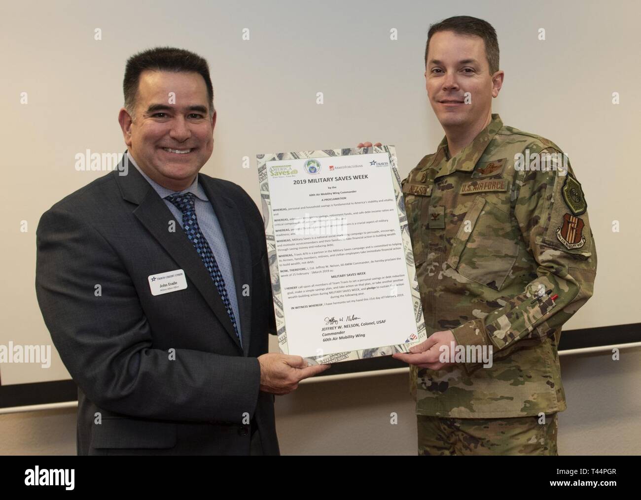 John Evalle, left,Travis Credit Union Military Affairs Officer and U.S ...