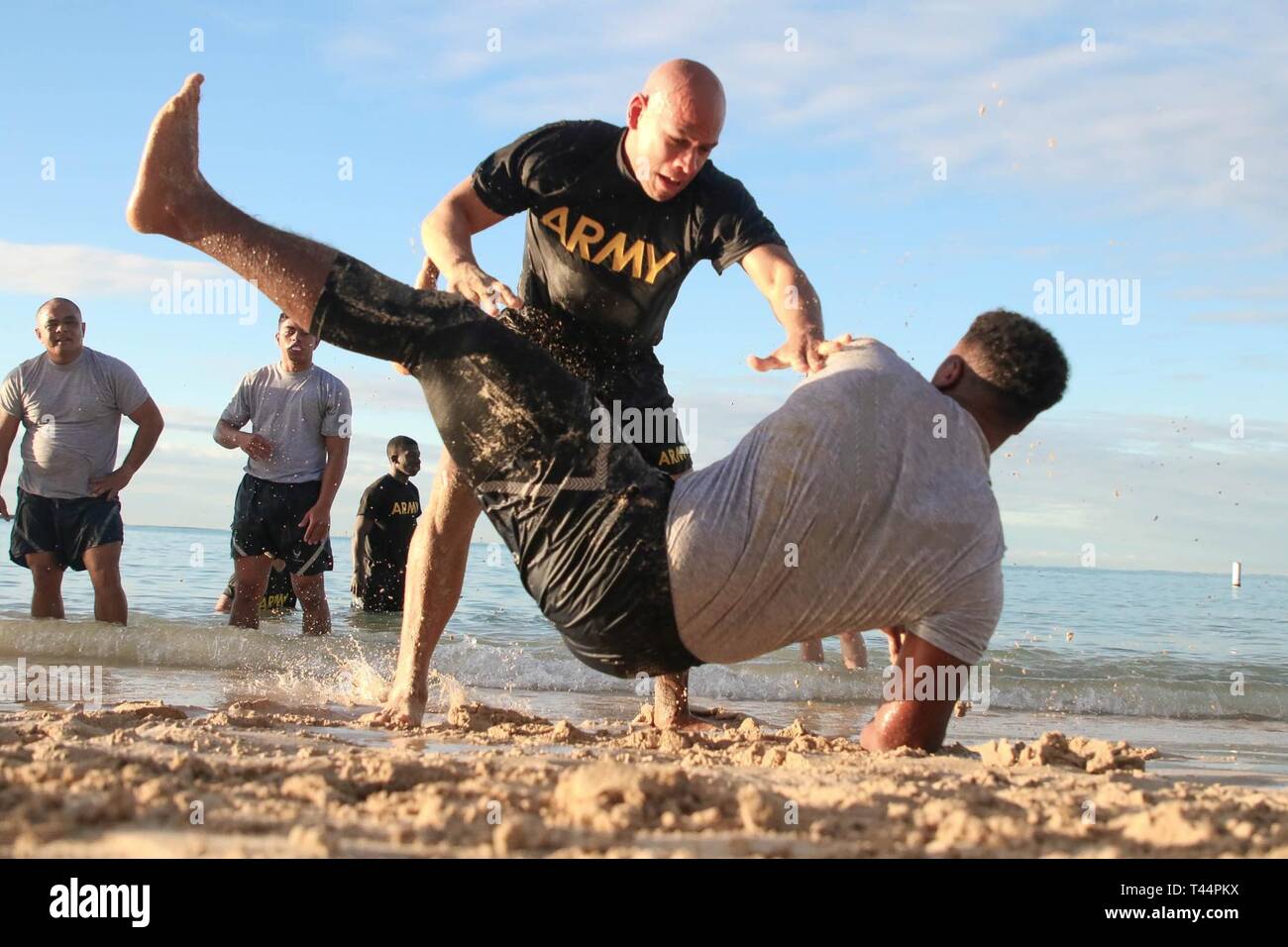 A U.S. Army Soldier takes down an U.S. Air Force Airman during a U.S ...
