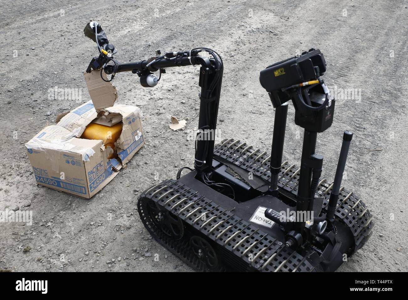 Explosive Ordnance Disposal (EOD) Marines use a Talon, an EOD robot ...