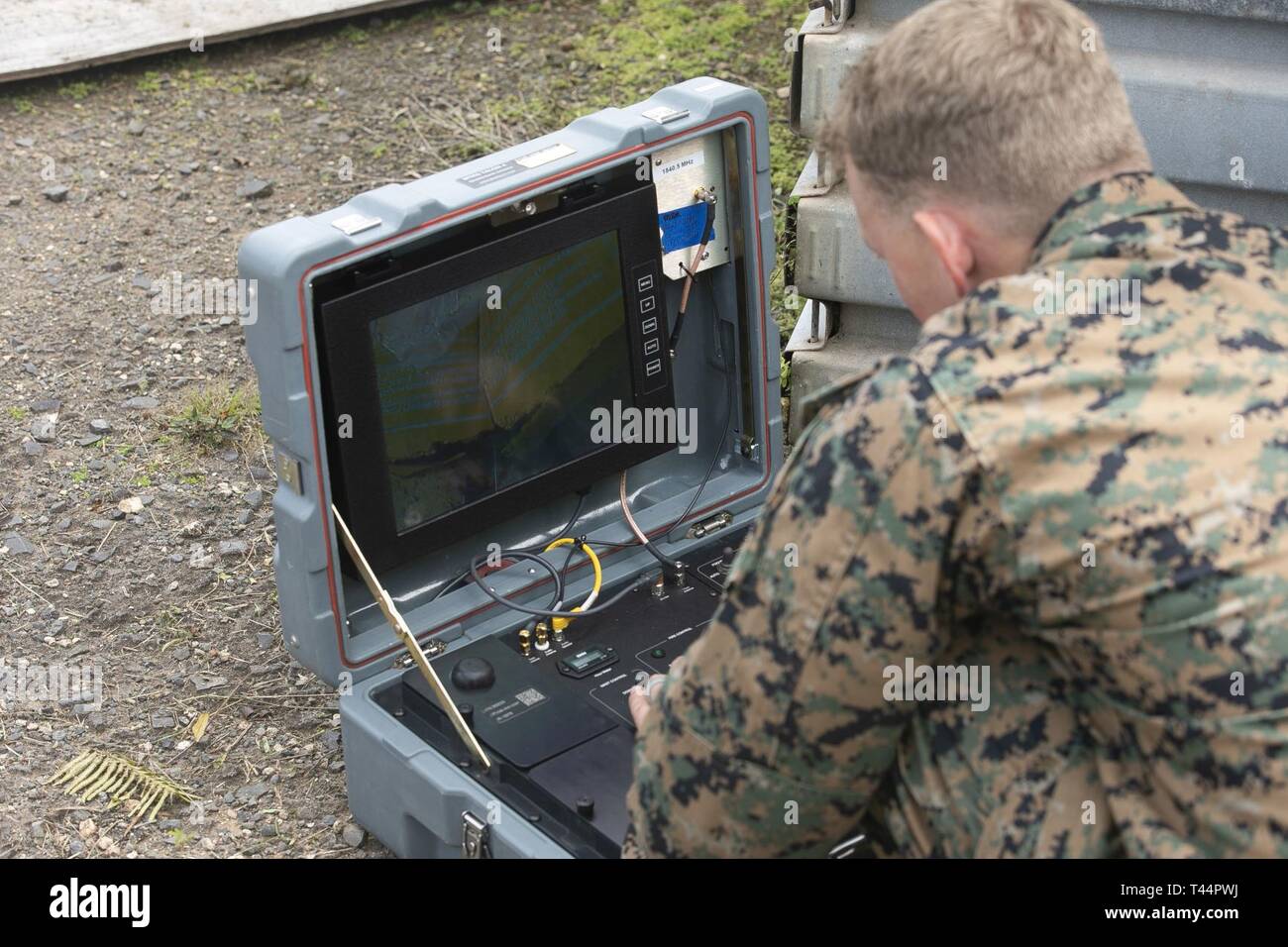 U.S. Marine Corps Staff Sgt. Seth Barnes, an Explosive Ordnance ...