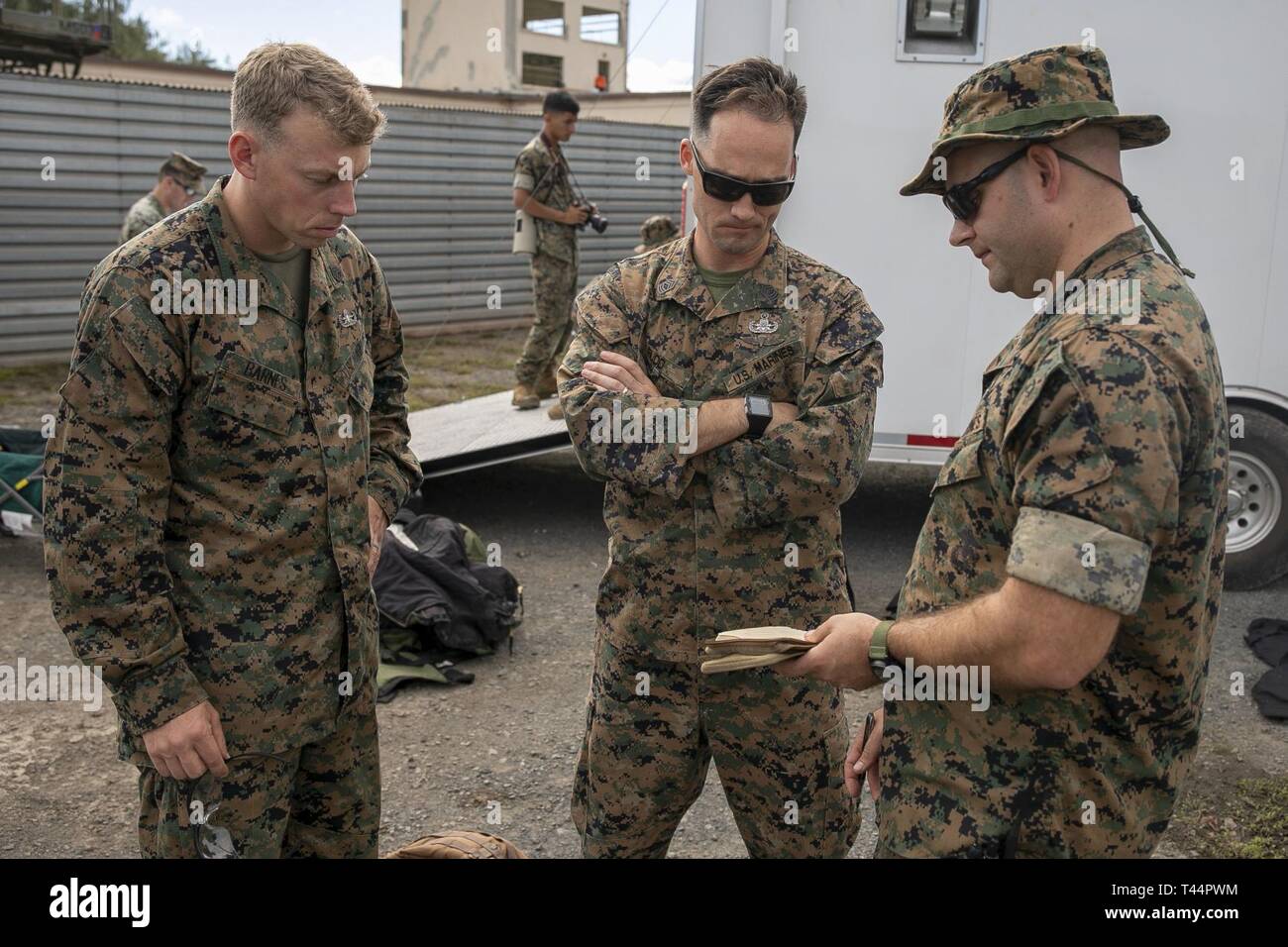 U.S. Marine Corps Staff Sgt. Seth Barnes and Master Sgt. John Rudd ...